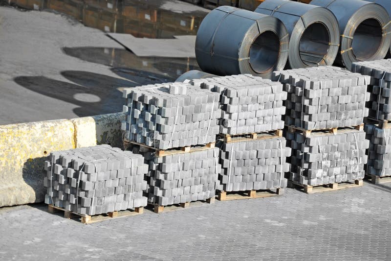 Cobblestone and Rolled Metal in Port Stock Photo - Image of factory ...