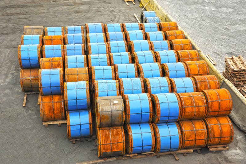 Rusty rolled metal in port stock image. Image of damaged - 113174617