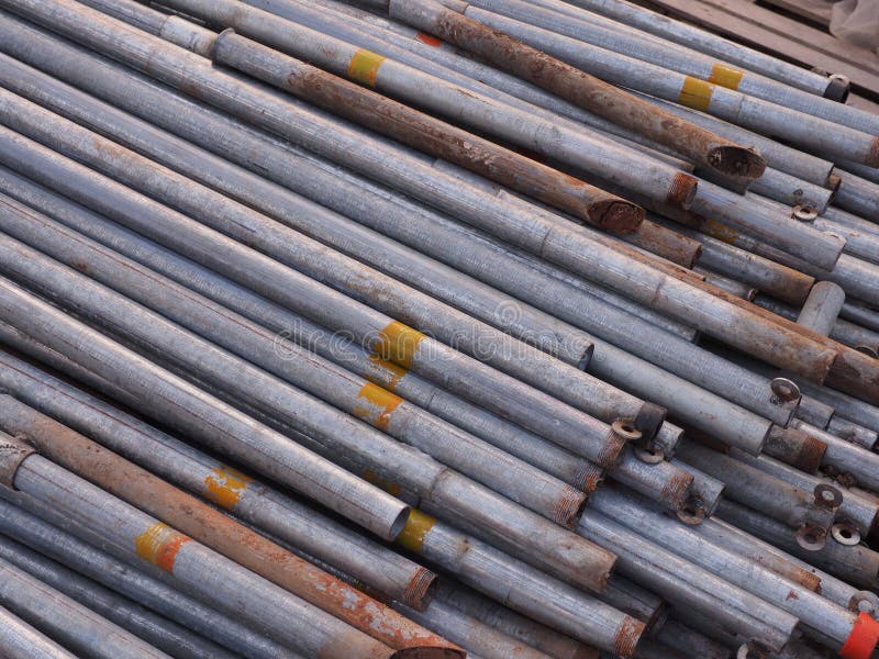 Stacked Scaffolding poles stock image. Image of steel - 90837975