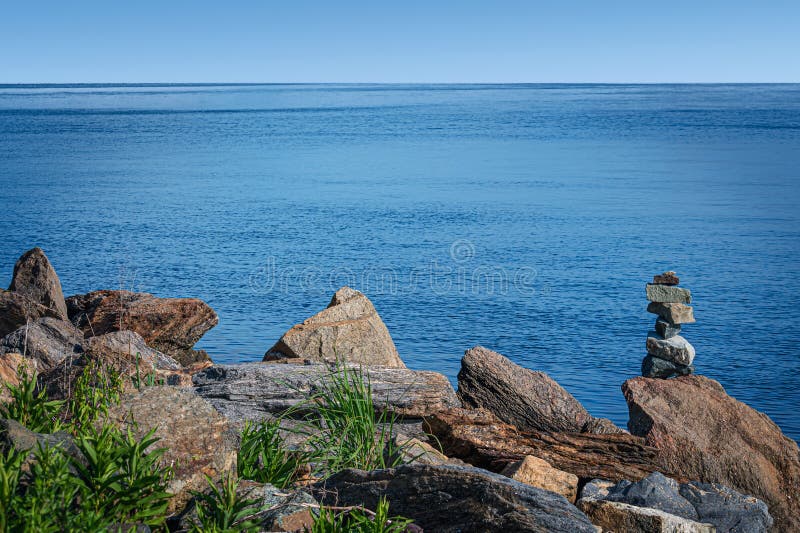 Stacked on Shoreline stock image. Image of hook, boulders - 223490801