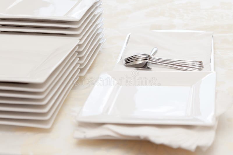 Stacked square plates stock photo. Image of cloth, pile - 22334020