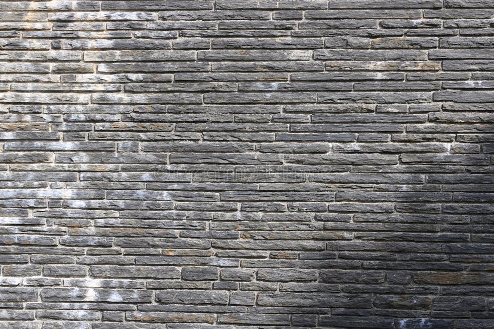 Stacked Stone Brick Wall. Stone Cladding Wall Made of Natural Grey ...