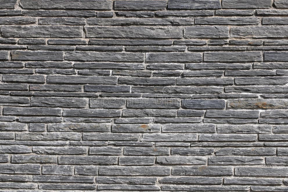 Stacked Stone Brick Wall. Stone Cladding Wall Made of Natural Grey ...
