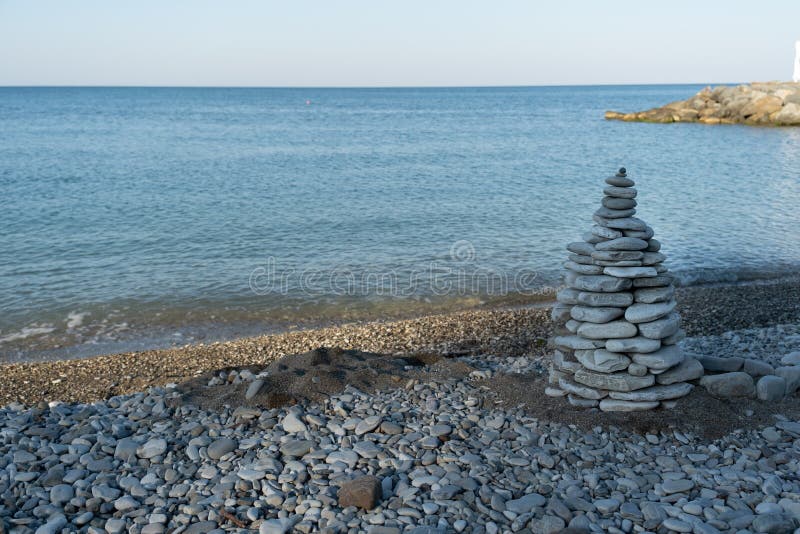 Stacked Stone Figure on the Beach Stock Image - Image of figure ...