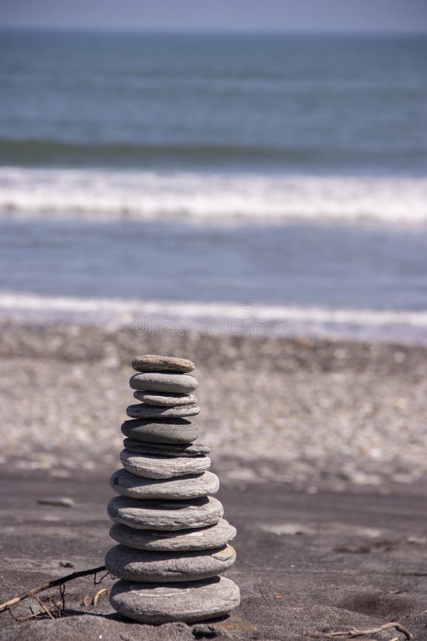 Stacked Stones on the Beach Stock Photo - Image of rock, stone: 149850224