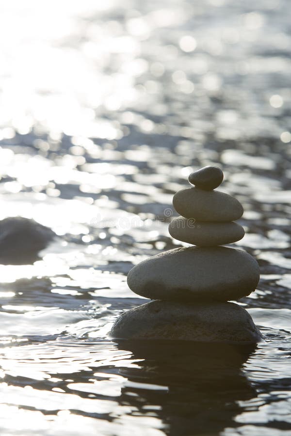 Stacked stones in water stock image. Image of balance - 144417573