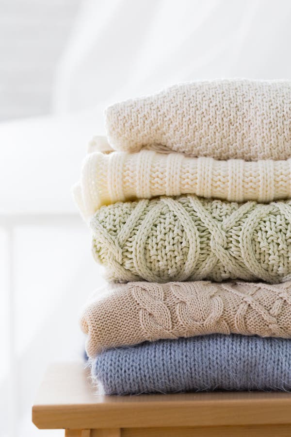 Stacked sweaters stock image. Image of life, clothes - 66933915