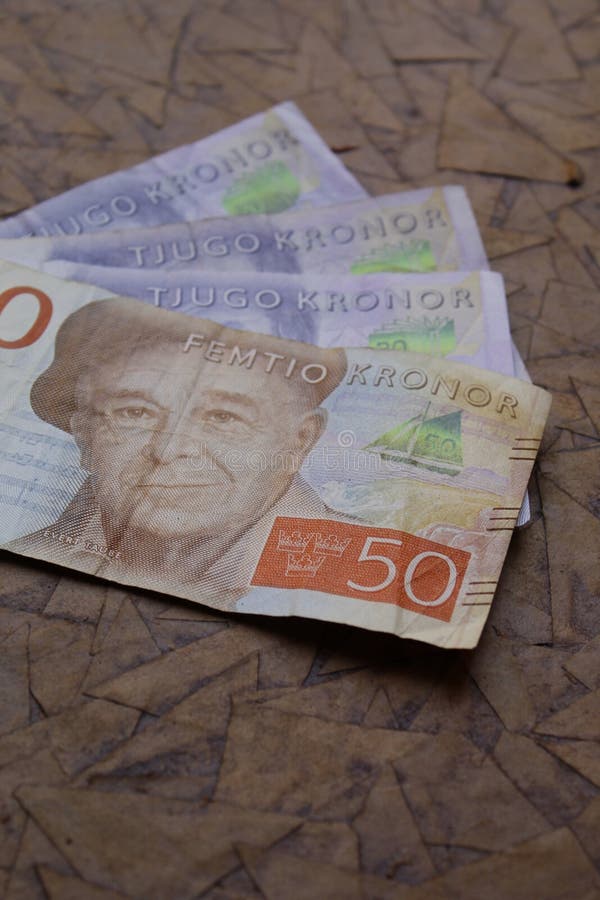 Stacked Swedish Banknotes of Different Denomination on the Brown Table ...