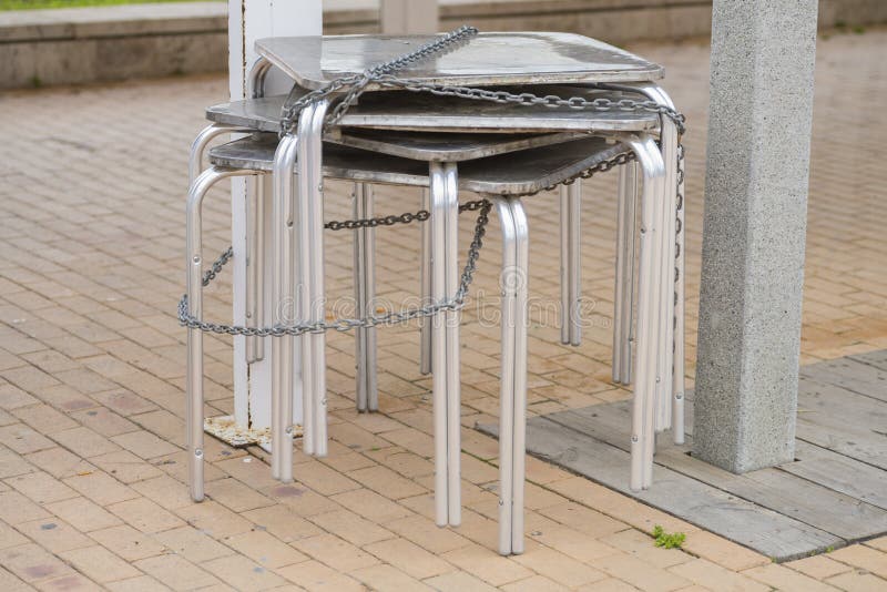 Stacked tables. stock image. Image of closed, outside - 56912525