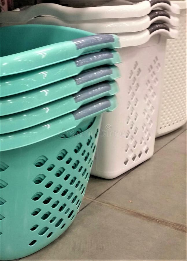 Stacked Teal and White Plastic Laundry Baskets Stock Image - Image of ...