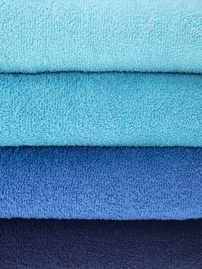 Stacked Towels in Different Colors Stock Photo - Image of macro ...