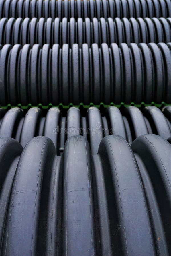 Black Plastic Curvilinear PVC Pipe Stock Image - Image of lining ...