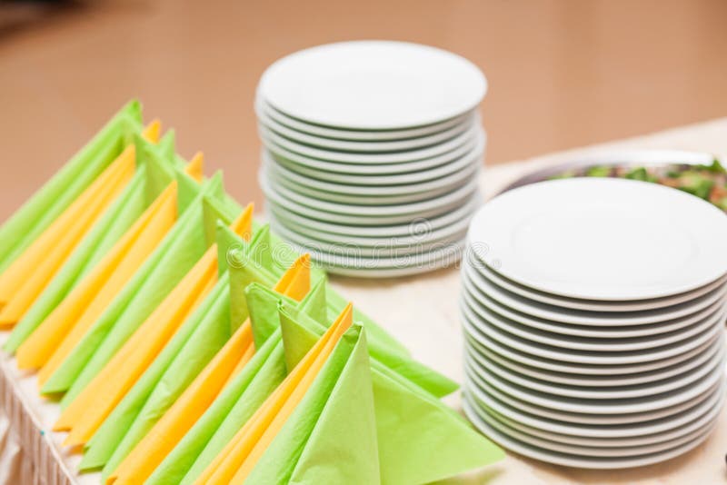 Stacked White Clean Plates with Napkins in Restaurant Stock Image ...