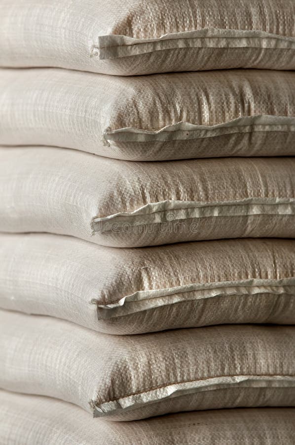 Stacked white sacks stock image. Image of texture, string - 19672445