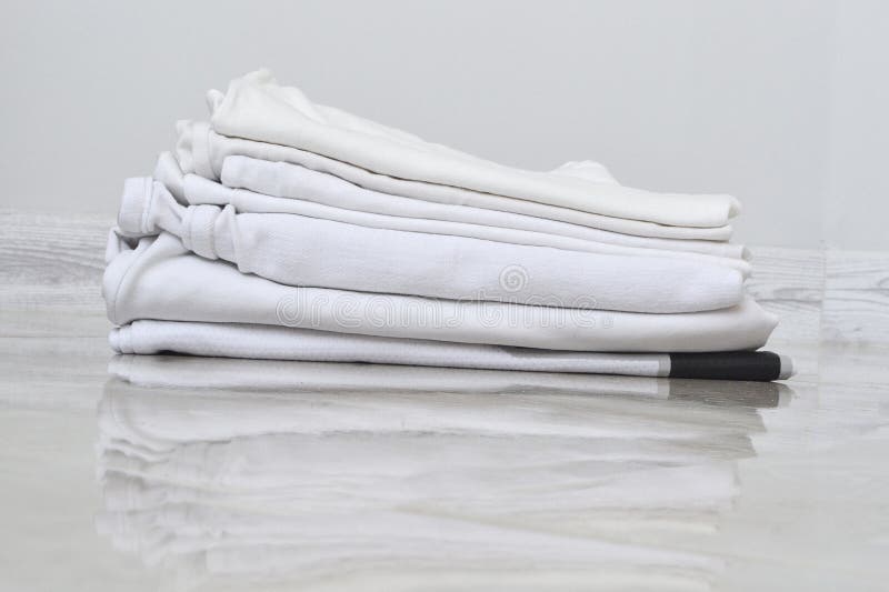 Stacked White Things Lie on a White Background Stock Image - Image of ...