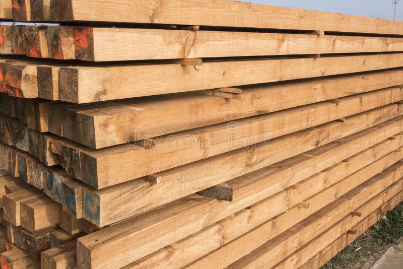 Stacked wooden beams stock photo. Image of solid, ecological - 303073170