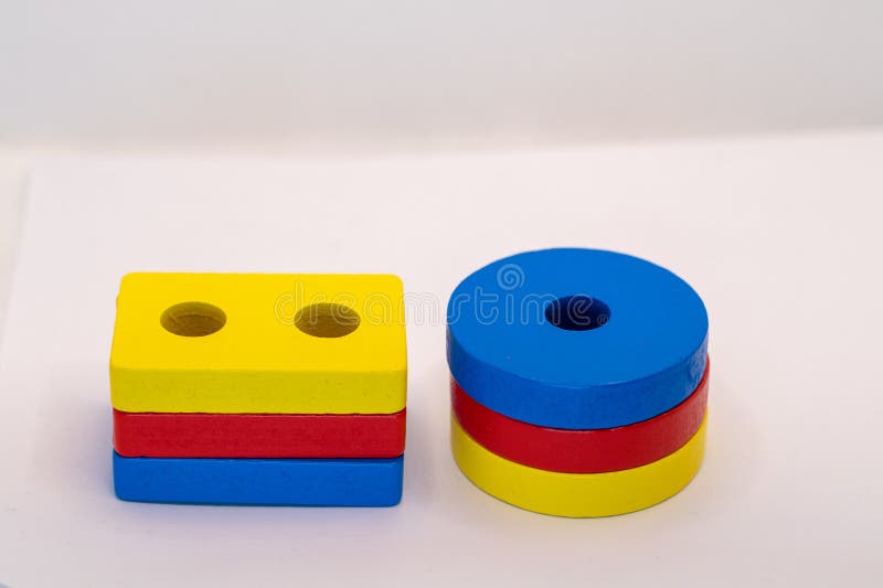 Stacked Wooden Blocks: Rectangular and Cylindrical Stock Photo - Image ...