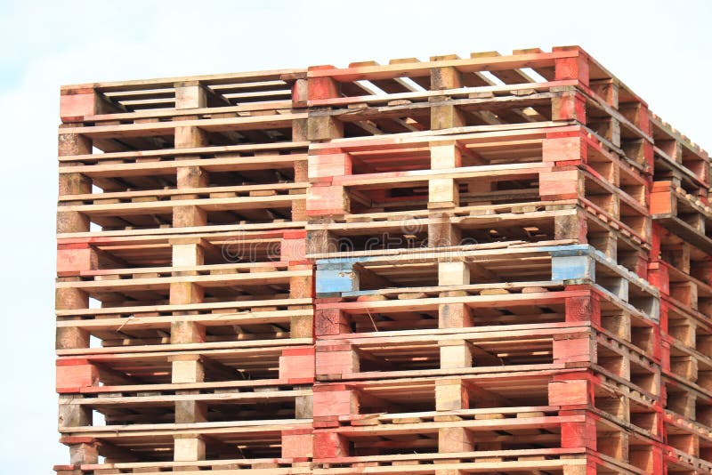 Stacked wooden pallets stock photo. Image of wooden - 174990252