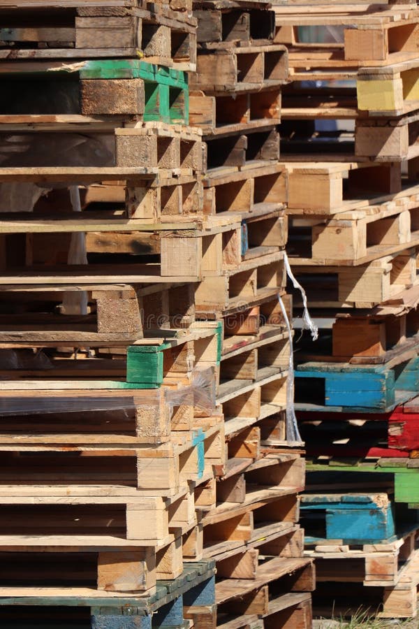 Stacked wooden pallets stock image. Image of eurpallet - 246463329