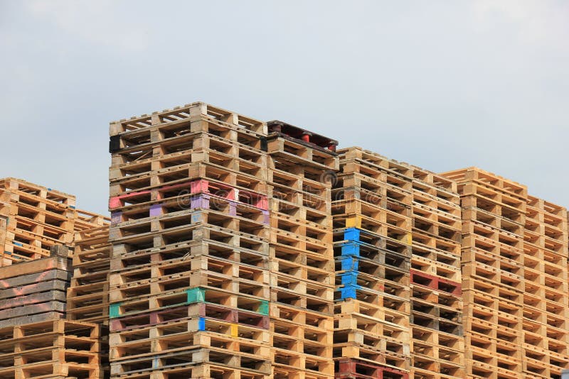 Stacked wooden pallets stock image. Image of wooden, block - 53918943