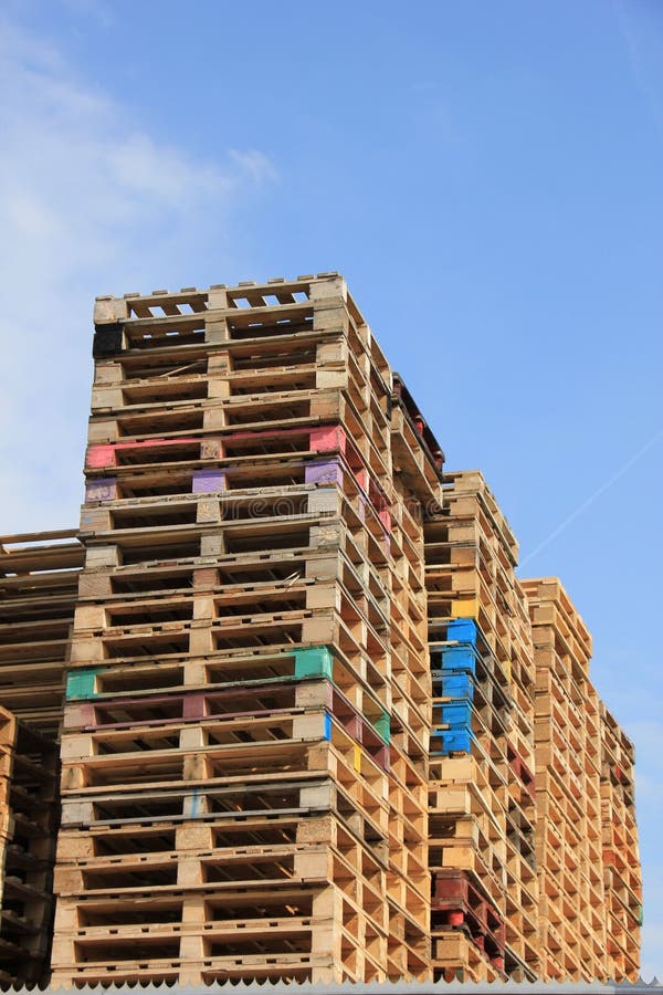 Stacked wooden pallets stock photo. Image of logistic - 53918956