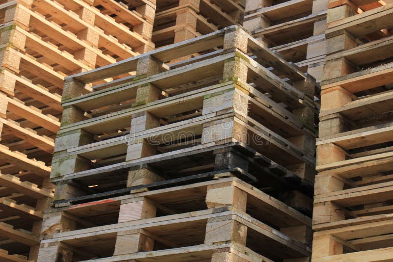 Stacked wooden pallets stock photo. Image of pallet, wooden - 93066482