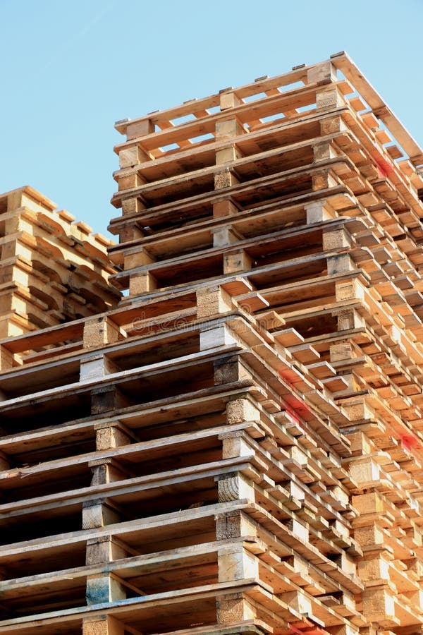 Stacked wooden pallets stock photo. Image of wood, shipping - 147806326