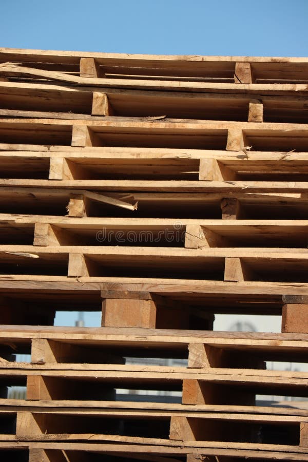 Stacked wooden pallets stock image. Image of stack, logistic - 128128189