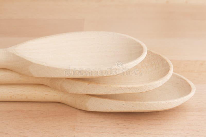 Stacked wooden spoons stock photo. Image of mixing, spoon - 36692140