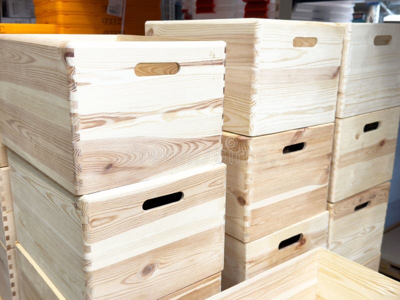 Stacked Wooden Storage Crates with Natural Finish in Warehouse Setting ...