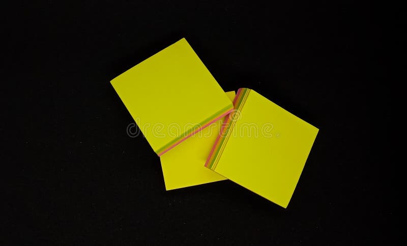Stacked Yellow Note Papers, Isolated on the Mini Black Studio Stock ...