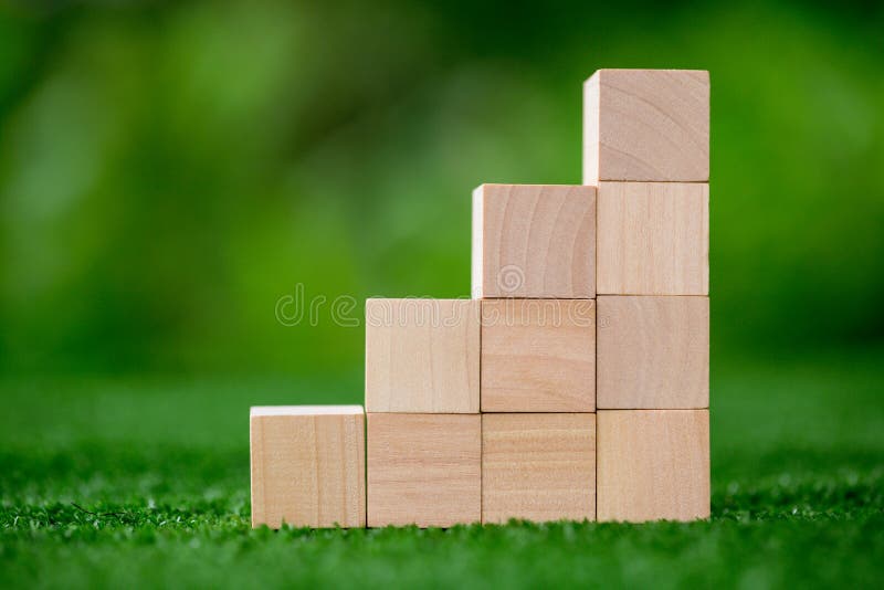 Stacking Blank Wooden Cubes on Green Background with Copy Space for ...