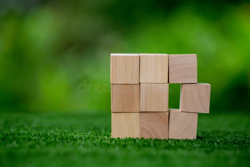 Stacking Blank Wooden Cubes on Green Background with Copy Space for ...
