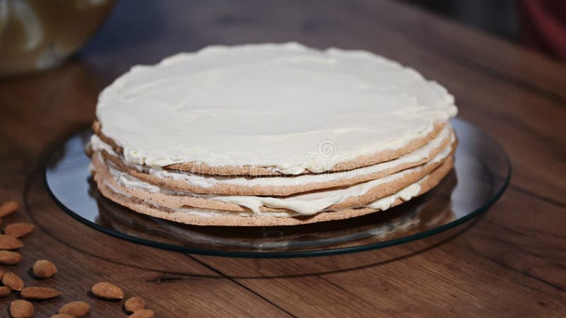 Stacking Cake Layers. Making Torte with Buttercream Filling Stock ...