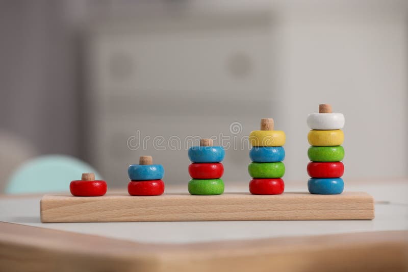 Stacking and Counting Game Wooden Pieces on Table Indoors, Space for ...