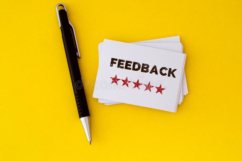 Stacking of Feedback with Five Star Drawn on White Business Card , a ...