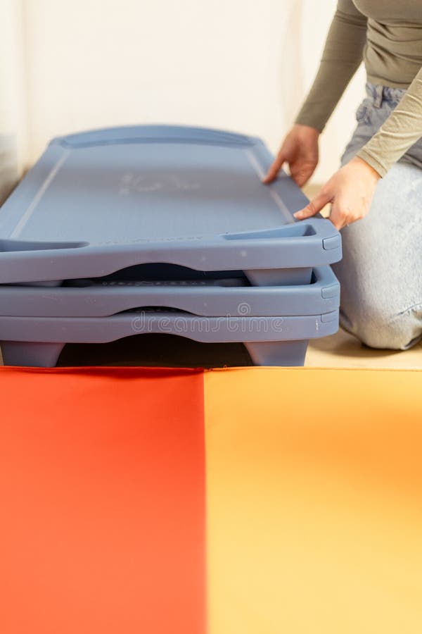 Stacking Plastic Storage Containers in a Home Environment during a ...
