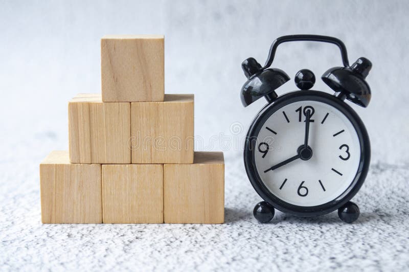 Alarm Clock Pointing at 2 O Clock with February 2023 on a Bench. Alarm ...