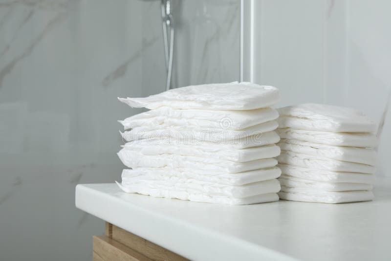 Stacks of Baby Diapers in Bathroom Stock Photo - Image of little ...