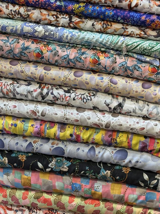 Stacks of Beautiful and Colorful Embroidered Cloth Stock Photo - Image ...