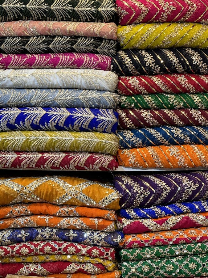 Stacks of Beautiful and Colorful Embroidered Cloth Stock Photo - Image ...