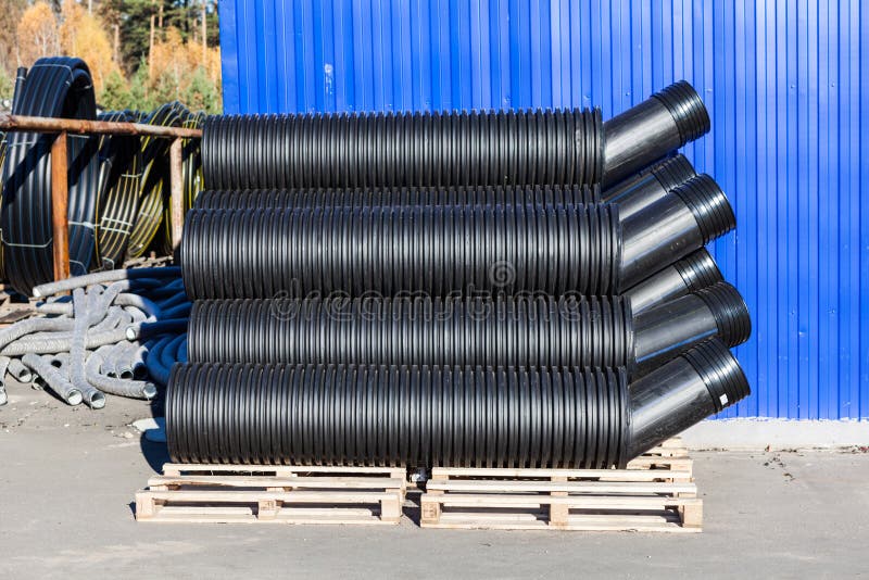 Stacks of Black Pvc Plastic Pipe Outdoors with Selective Focus Stock ...