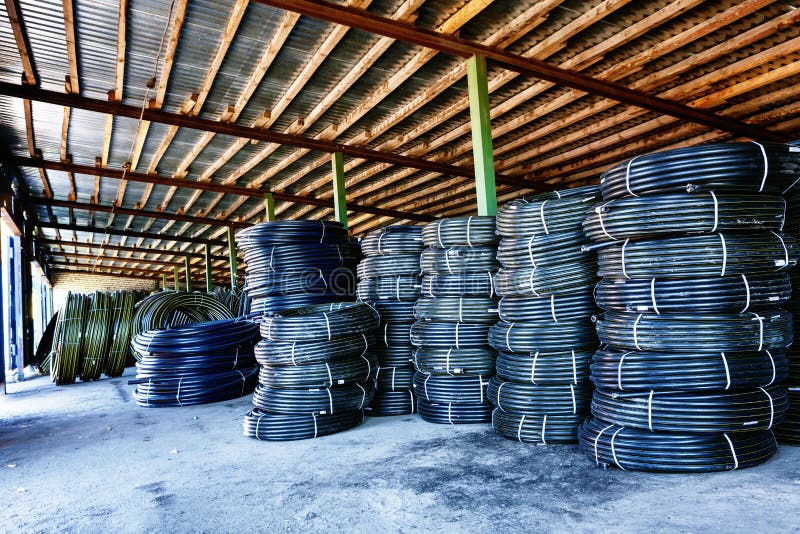 Stack Of Coiled Plastic Pvc Polyethylene Corrugated Drainage Pipes For ...