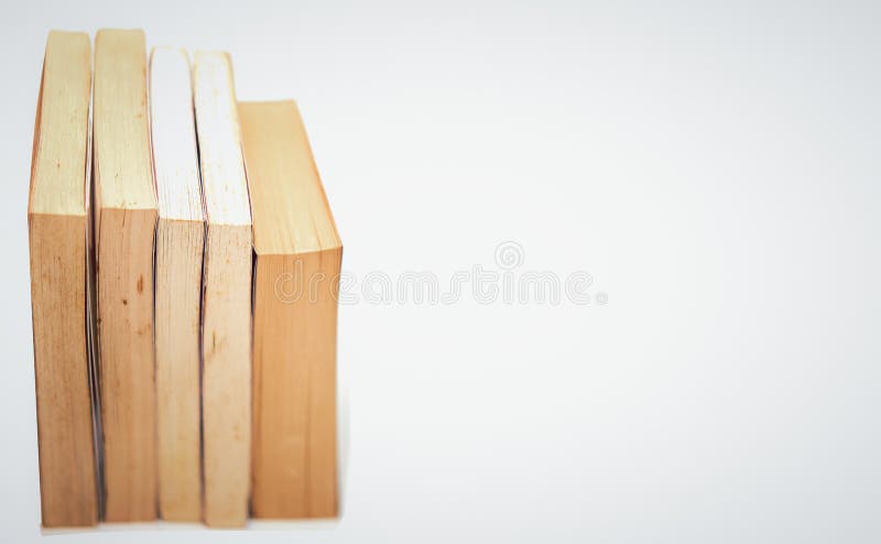 Set of Stacks of Books Arranged Horizontally on White Background Stock ...
