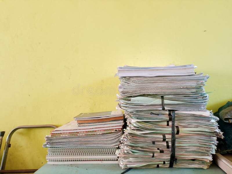 Stacks of Books and Papers Neatly Arranged on the Table Stock Image ...