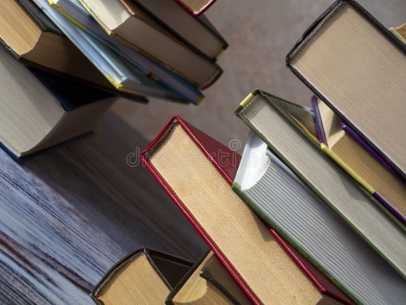 Stacks of Books on the Table at an Angle To the Background. Books Lie ...