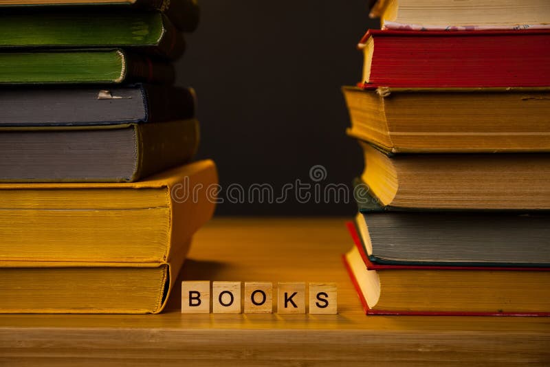 Stacks of Books on a Table in a Library Stock Image - Image of ...