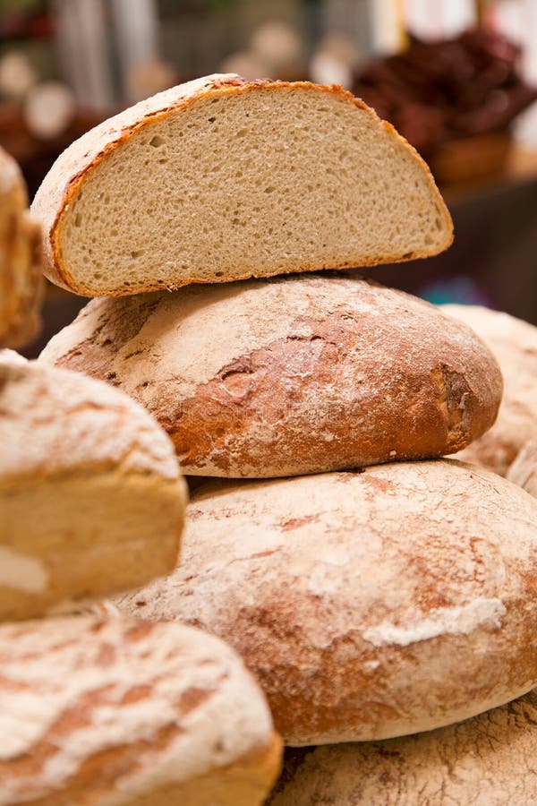 Stacked Loaves of Bread on Shelf in Bakery, Staple Food Stock Photo ...