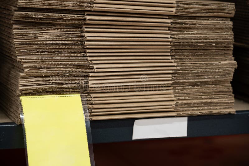 Cardboard Sheets Neatly Stacked in Storage Area for Packaging Use Stock ...