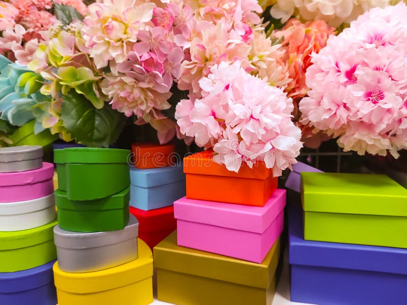 Stacks of Cardboard Boxes and Flowers Stock Photo - Image of gift ...